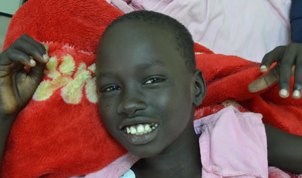 Success! Mamok from South Sudan raised $1,176 to fund knee surgery. | Watsi
