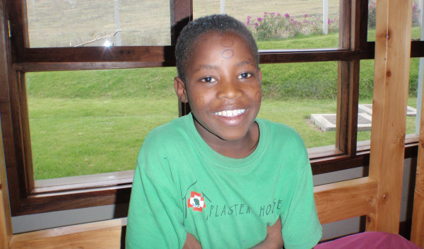 Lesian from Tanzania raised $555 so he can walk without pain. | Watsi